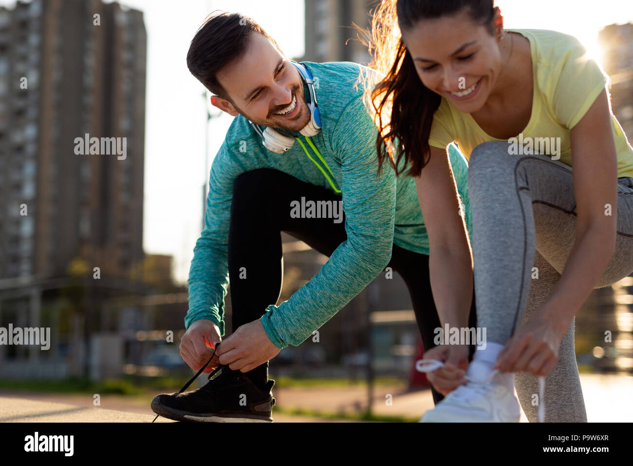 Cheerful friends group running marathon hi-res stock photography and ...