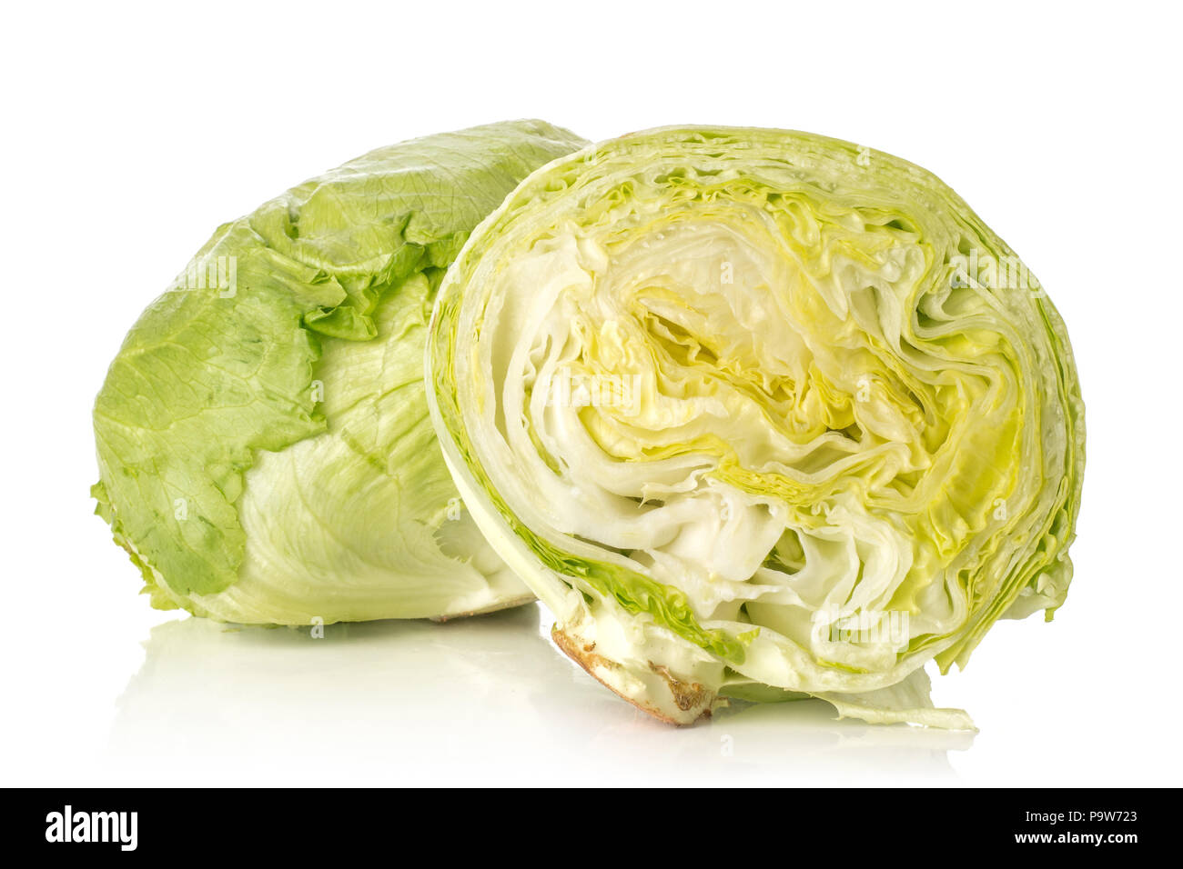 Iceberg lettuce one fresh green cabbage head and section half isolated ...