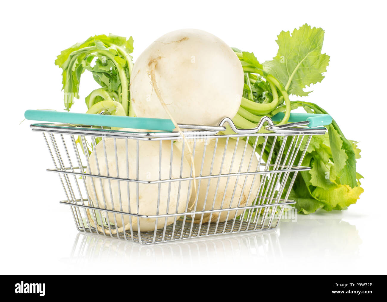 White radish with fresh leaves in a shopping basket isolated on white ...