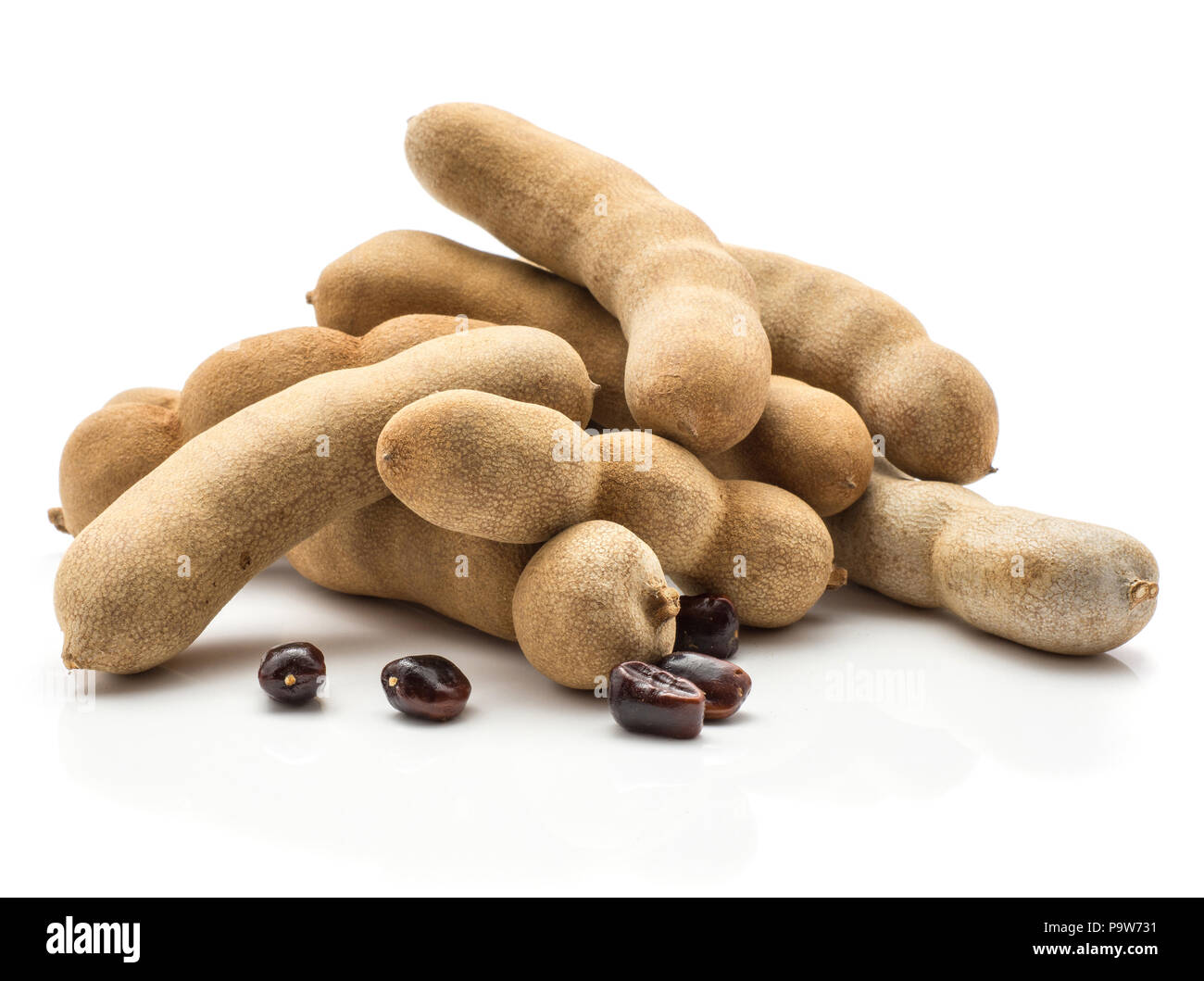 Tamarind in a brittle shell with four seeds isolated on white ...