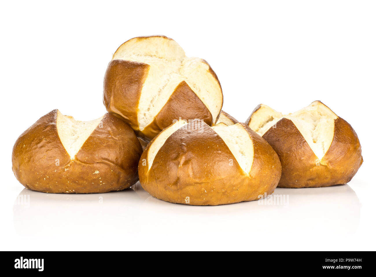 Fresh Bavarian bread buns heap isolated on white background four baked ...