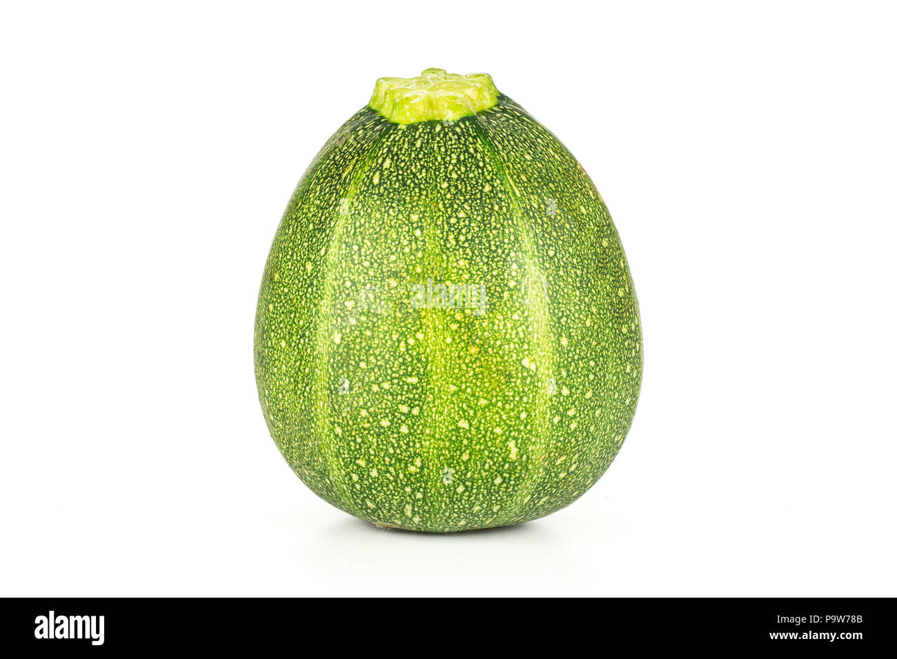One round zucchini fresh summer squash isolated on white background ...