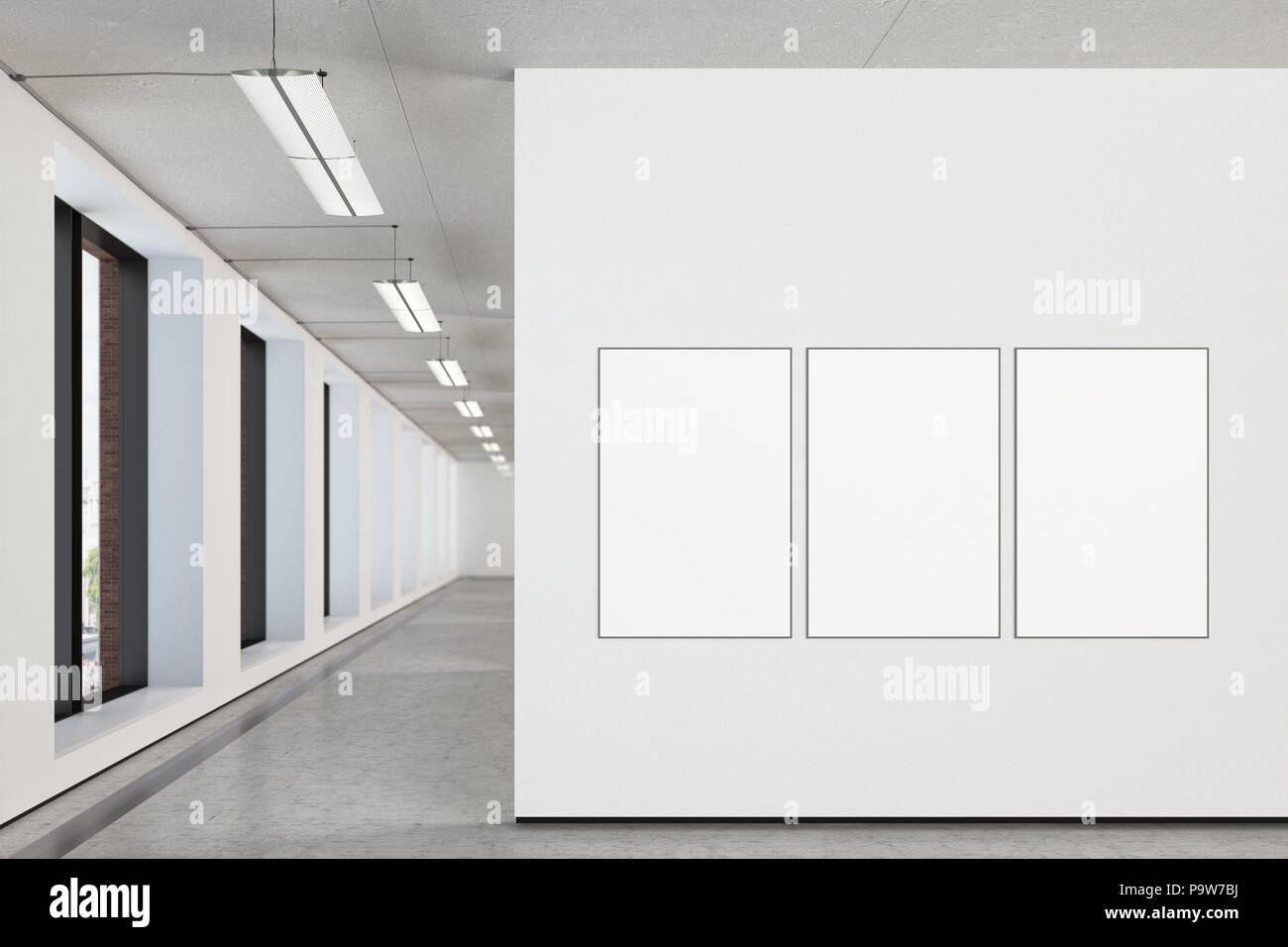 Three blank vertical posters in the gallery with clipping path around ...