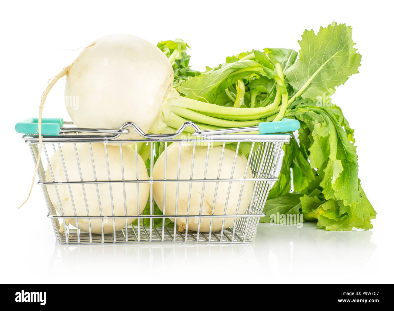 White radish bulbs with fresh leaves in a shopping basket isolated on ...