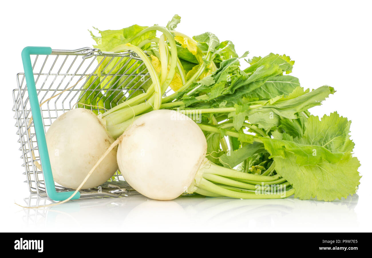 White radish bulbs with fresh leaves out a shopping basket isolated on ...