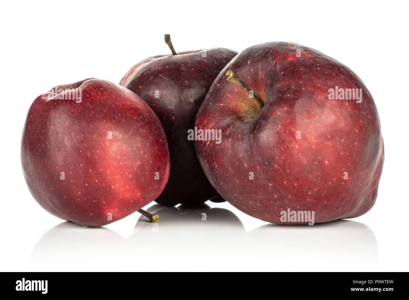 Three red delicious apples deep red isolated on white background Stock ...