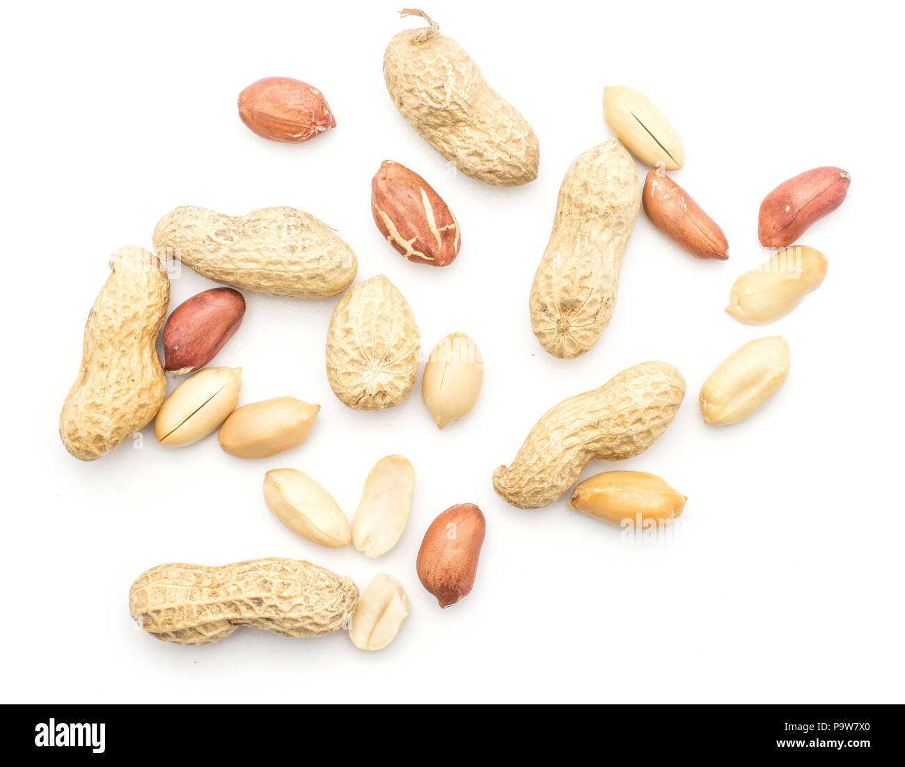 Raw peanuts top view isolated on white background (unshelled, shelled ...