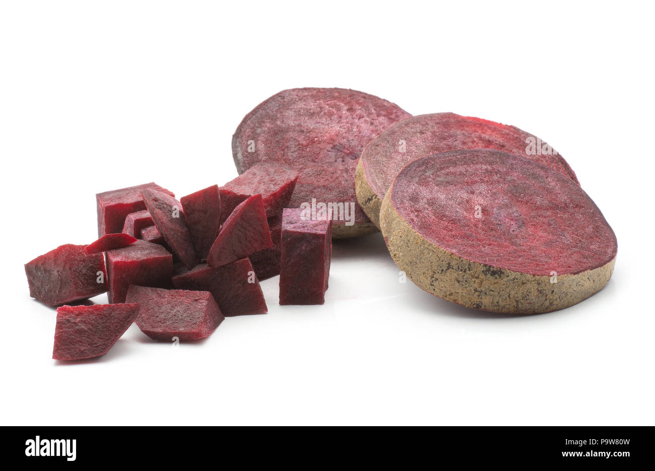 Sliced beetroot (raw red beet) three ring slices and chopped pieces ...