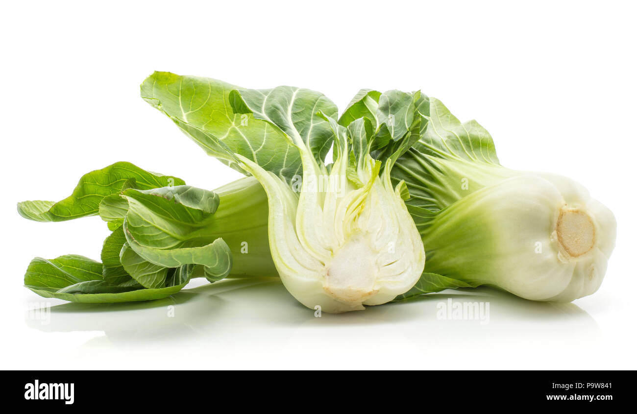 Bok choy (Pak choi) one cabbage and one section half isolated on white ...