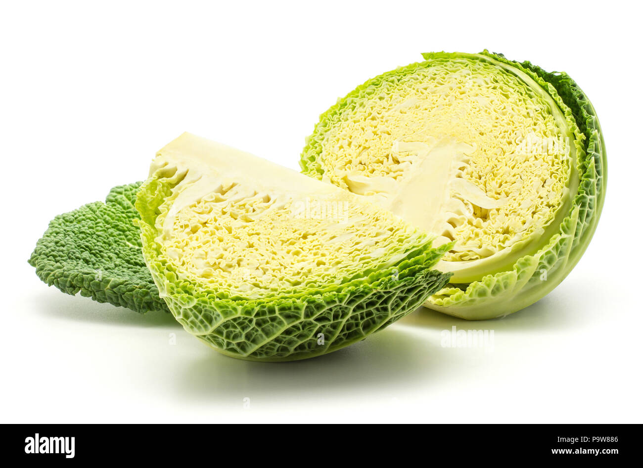 Savoy cabbage sliced half and quarter with separated leaf isolated on ...
