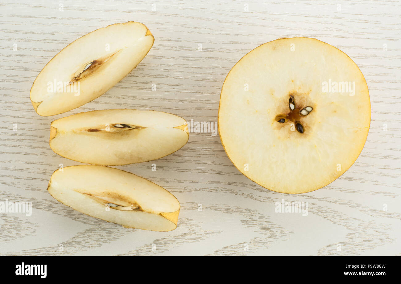 Chinese golden pears top view Nashi variety isolated on white wooden ...