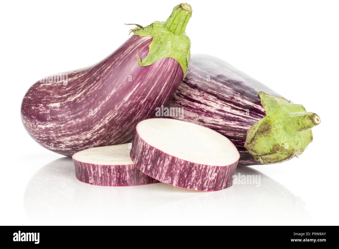 Two striped purple eggplants with two sliced rings isolated on white ...