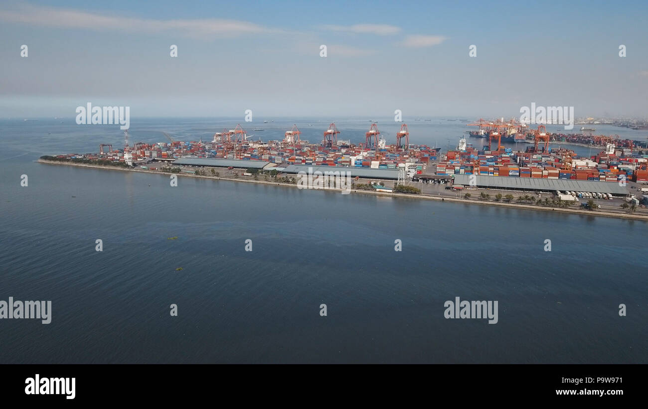 Aerial view industrial cargo port with ships and cranes, Manila. View ...