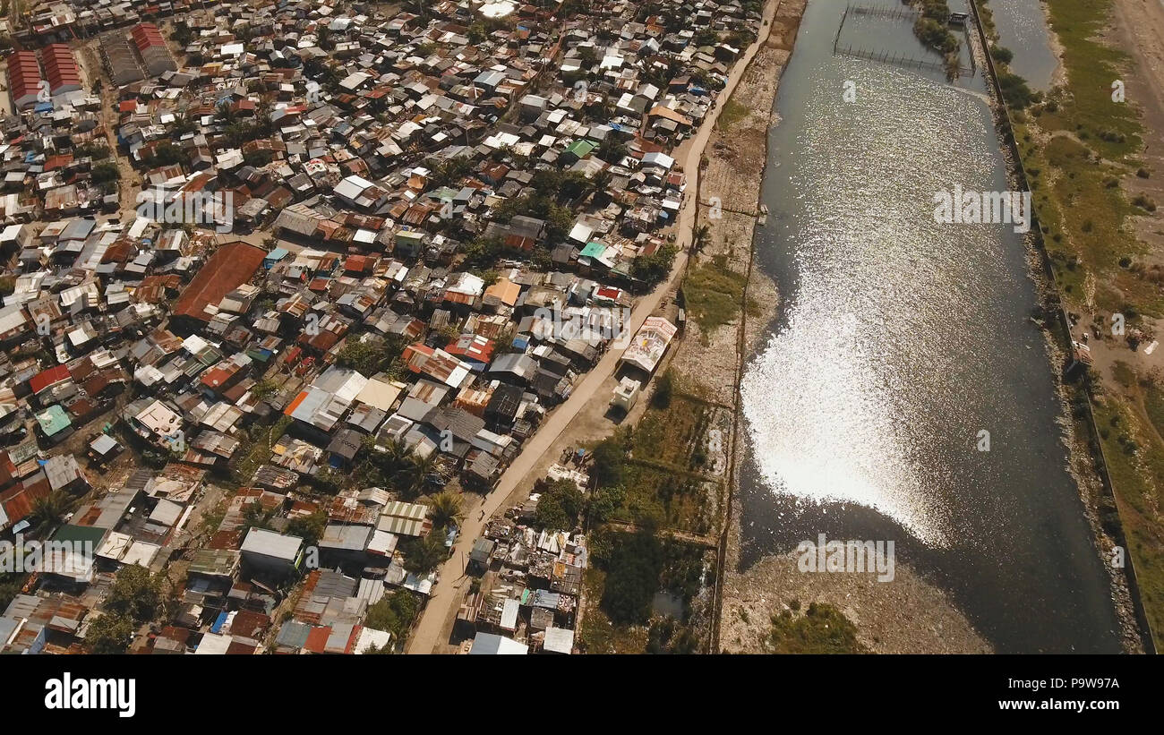 Aerial view poor district of Manila's slums, ghettos, wooden old houses ...