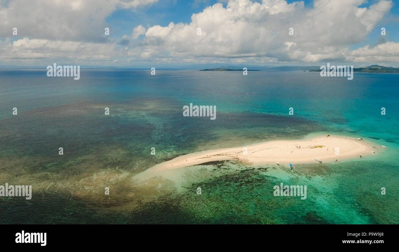 Aerial view of beautiful sand tropical island with white sand beach and ...