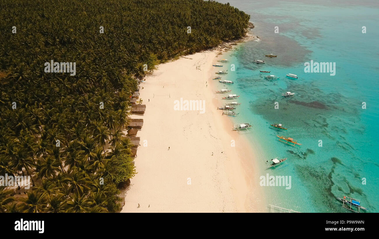 Aerial view of beautiful tropical island Daco with white sand beach ...