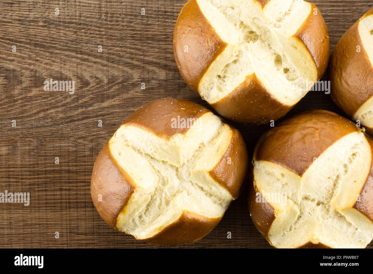 Bavarian bread buns top view on brown wood background fresh baked ...