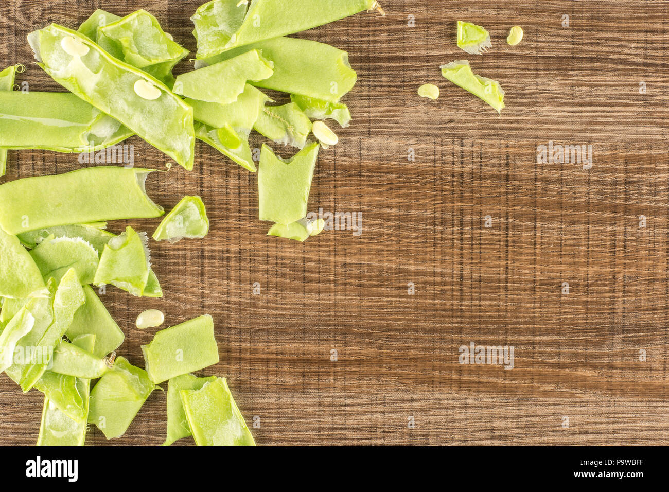 Flat green beans stack top view isolated on wooden background Stock ...