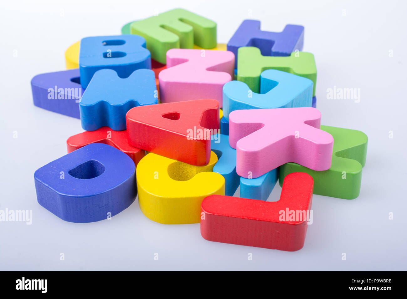 Letter cubes of Alphabet made of wood Stock Photo - Alamy