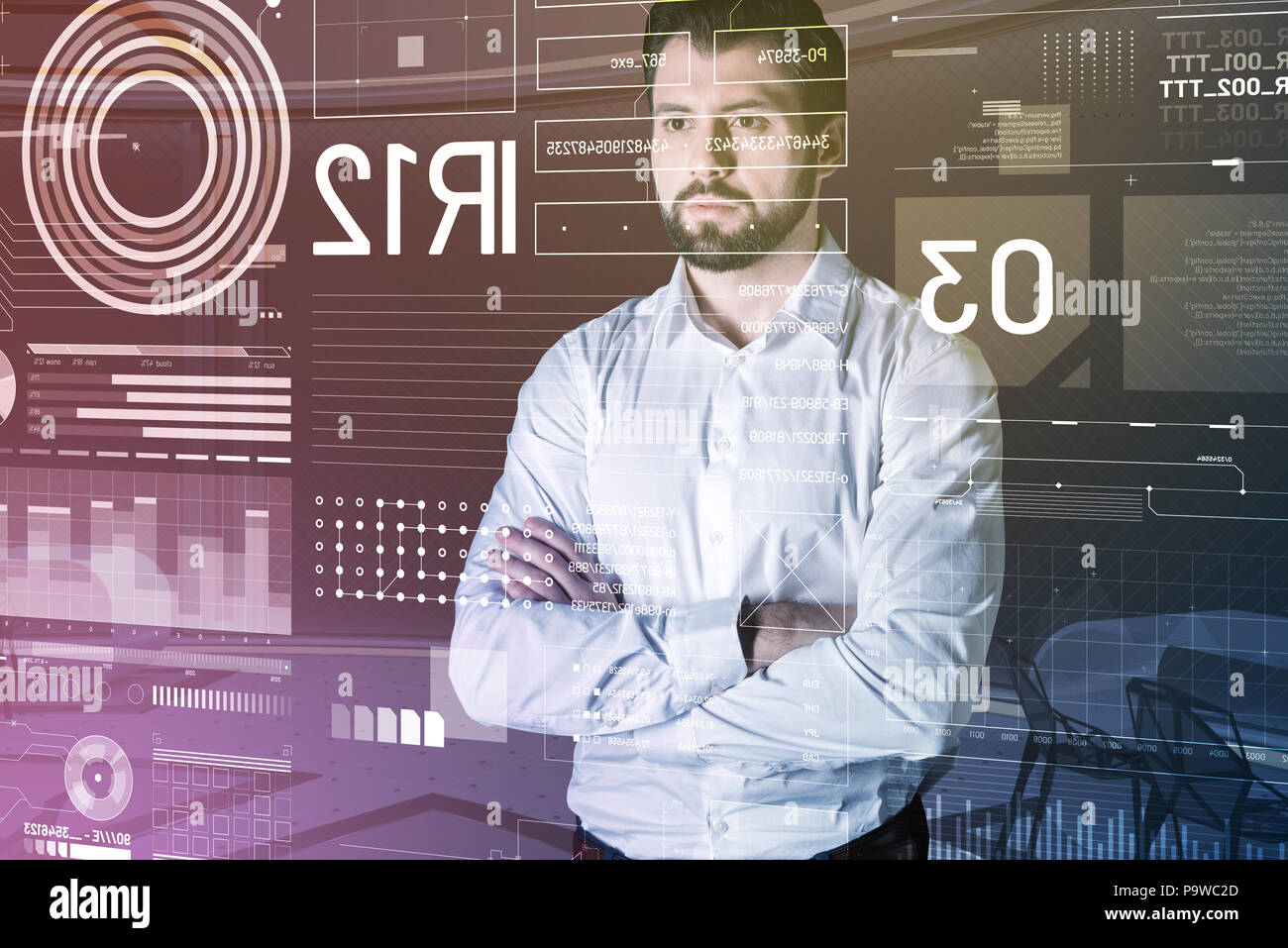 Serious look. Clever serious programmer feeling worried and standing ...