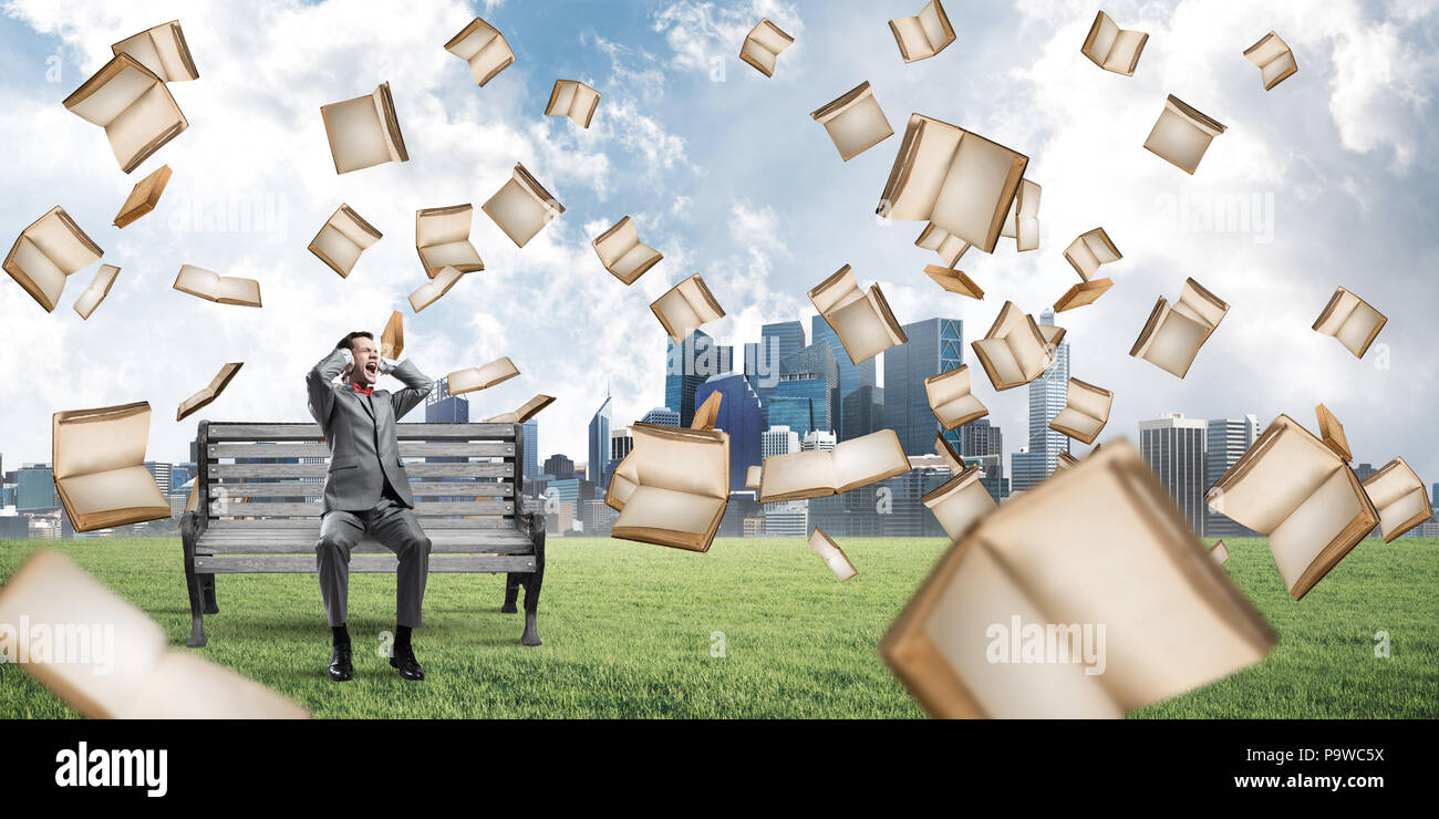 Book falling grass hi-res stock photography and images - Alamy