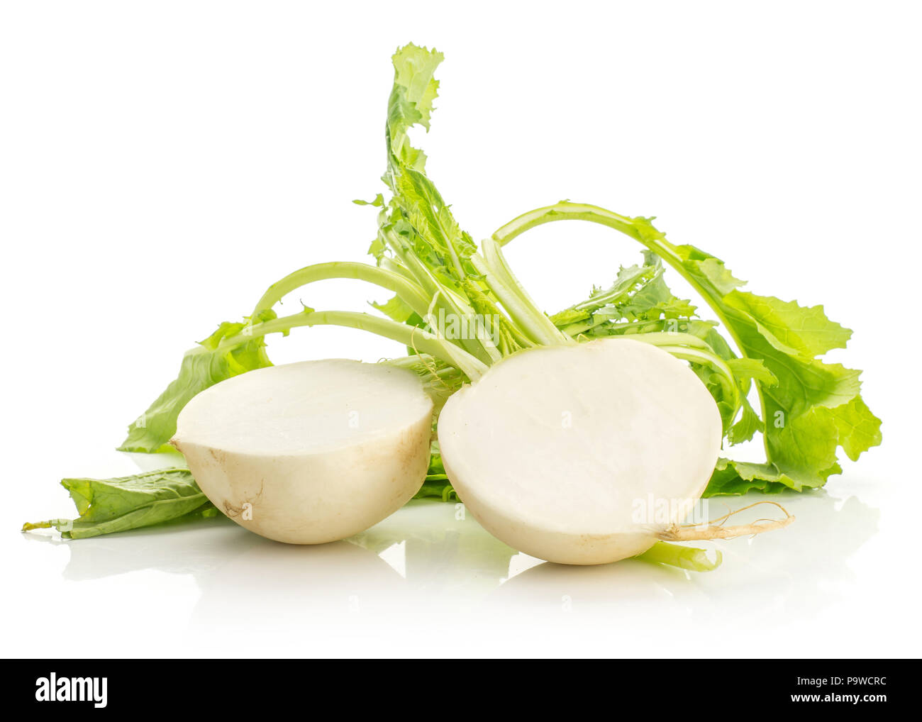 Sliced white radish with fresh leaves isolated on white background two ...