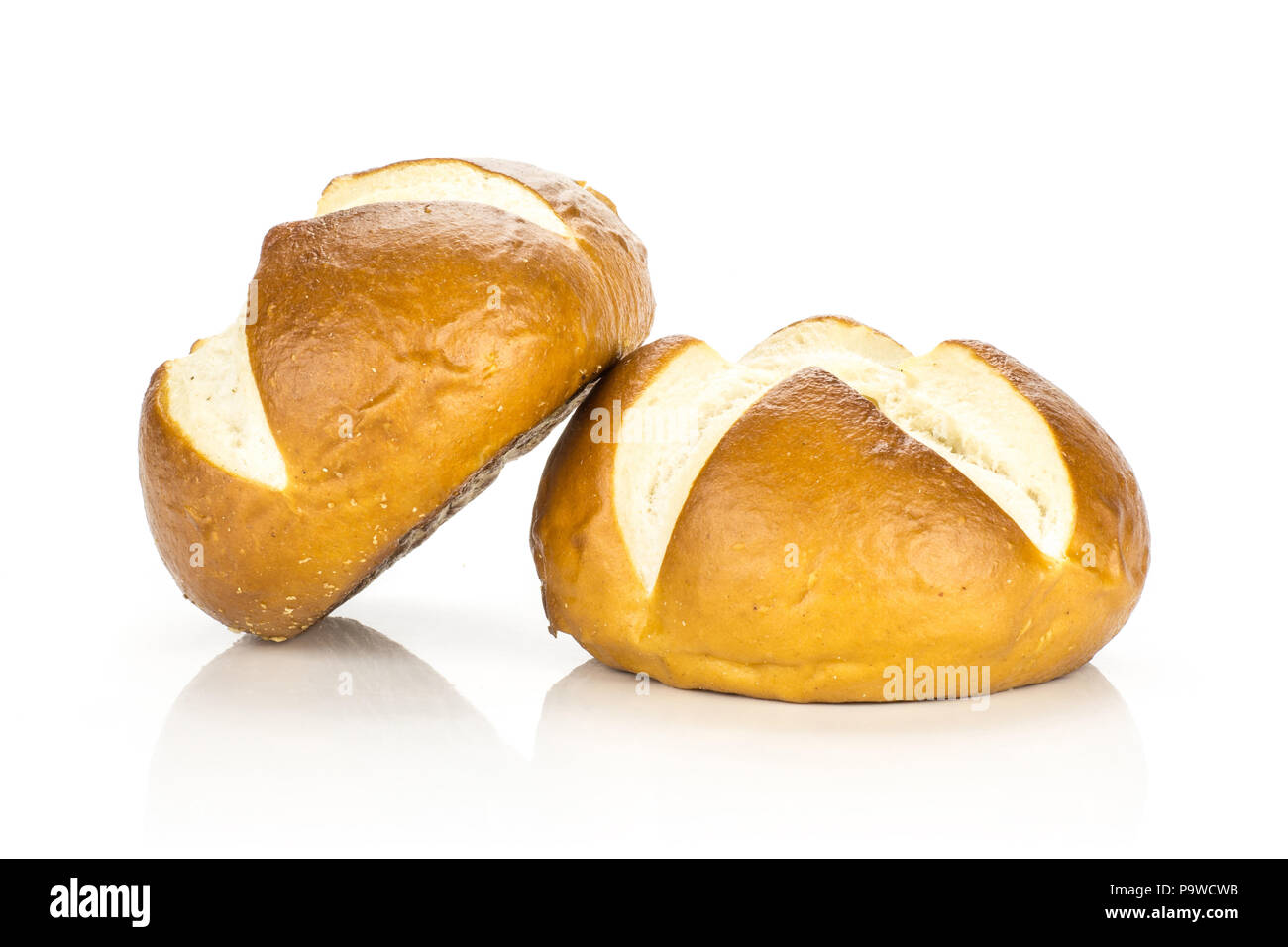 Bavarian bread buns isolated on white background two fresh baked loaves ...