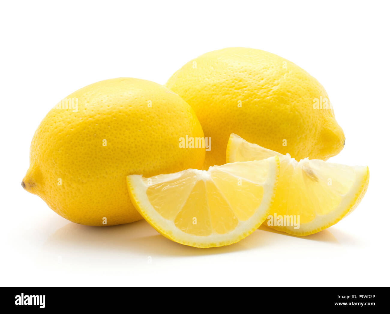 Two yellow lemons two slices isolated on white background Stock Photo ...