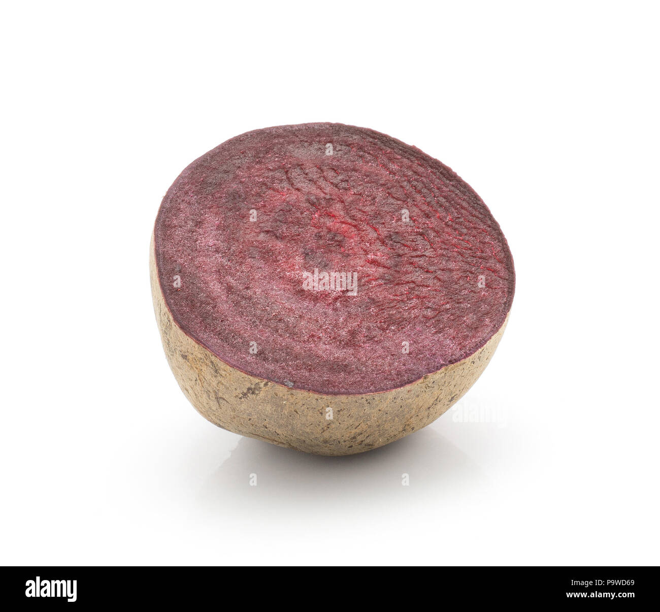 One beetroot half (raw red beet) isolated on white background Stock ...