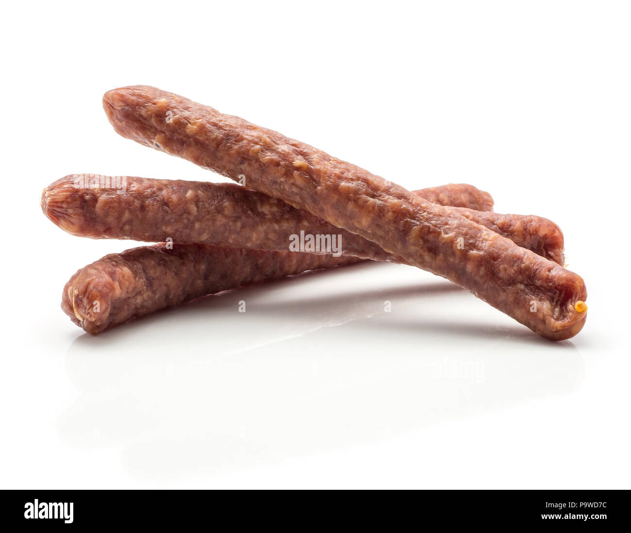 Hungarian dry sausages pepperoni fan isolated on white background three ...