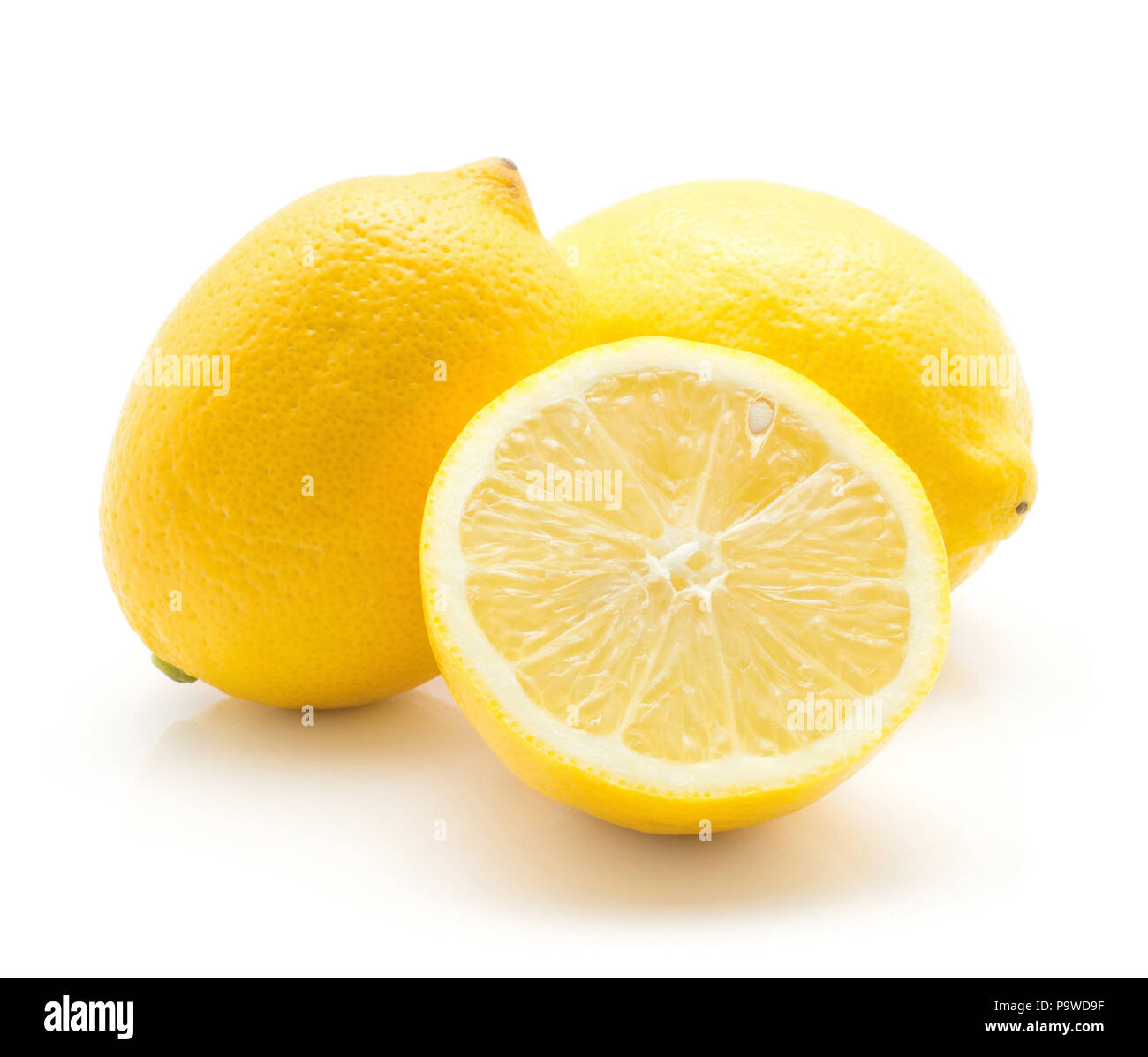 Yellow lemons isolated on white background two whole ripe and one cross ...