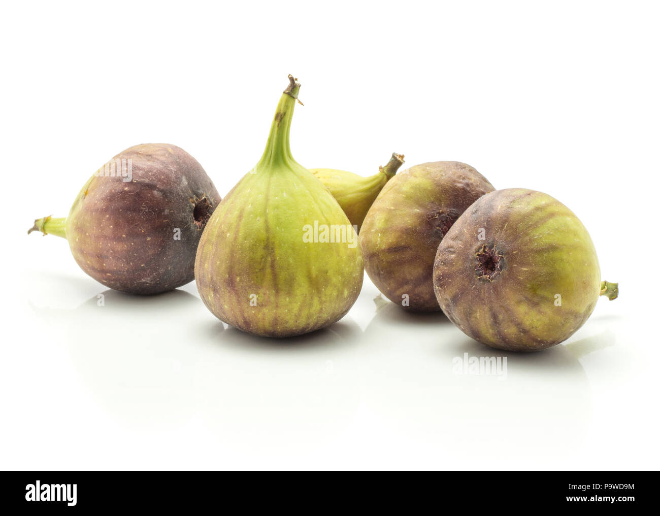 Five figs set isolated on white background fresh ripe purple green ...