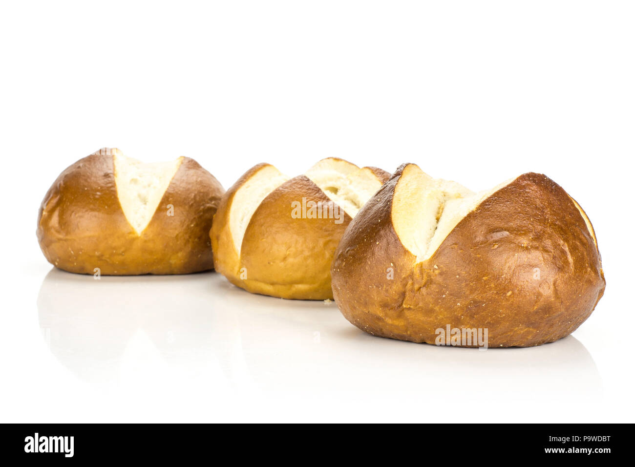 Fresh Bavarian bread buns isolated on white background three baked ...