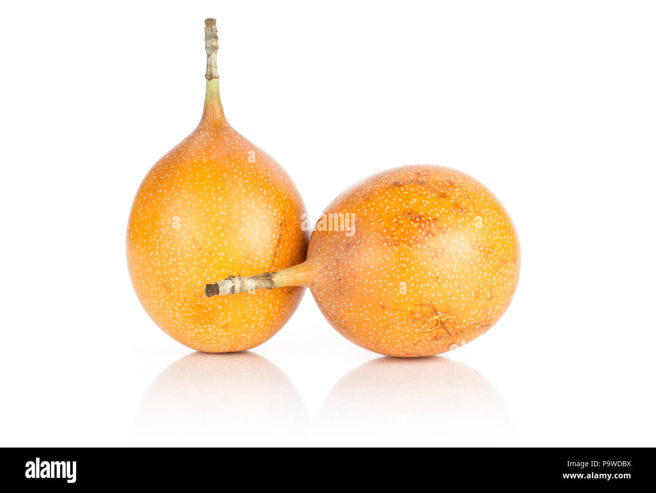 Giant grenadilla isolated on white background two sweet yellow passion ...