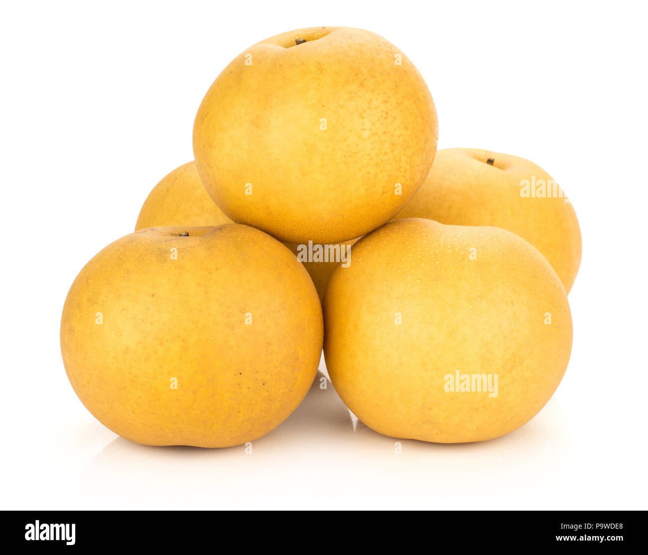 Chinese golden pears heap Nashi variety isolated on white background ...