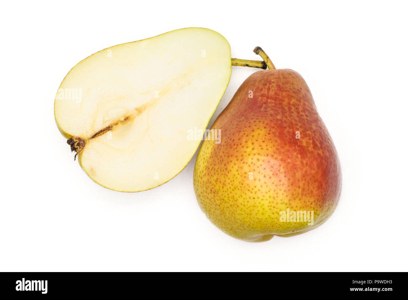 Group of one whole one half of fresh red pear forelle variety flatlay ...