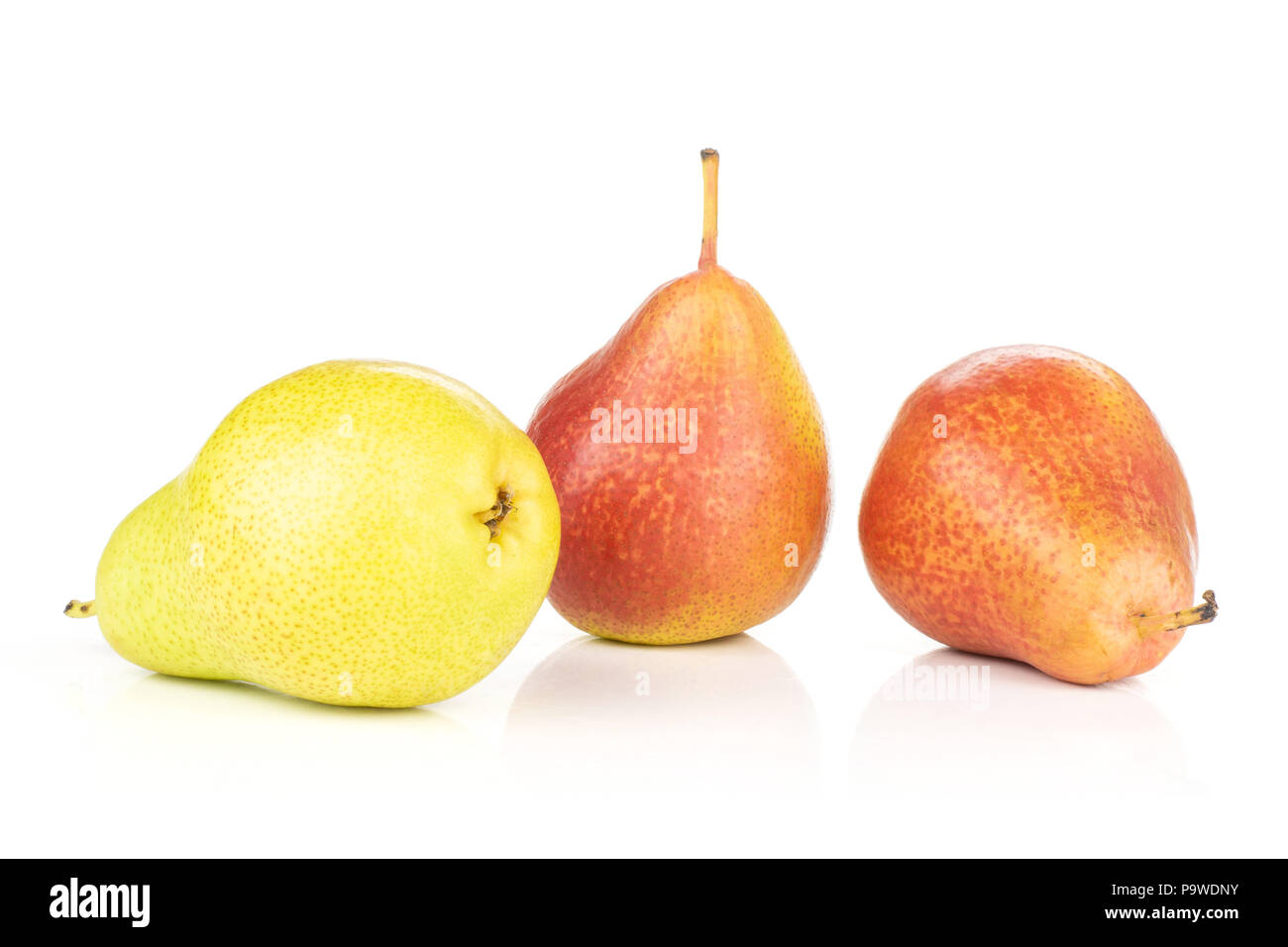 Group of three whole fresh red pear forelle variety isolated on white ...