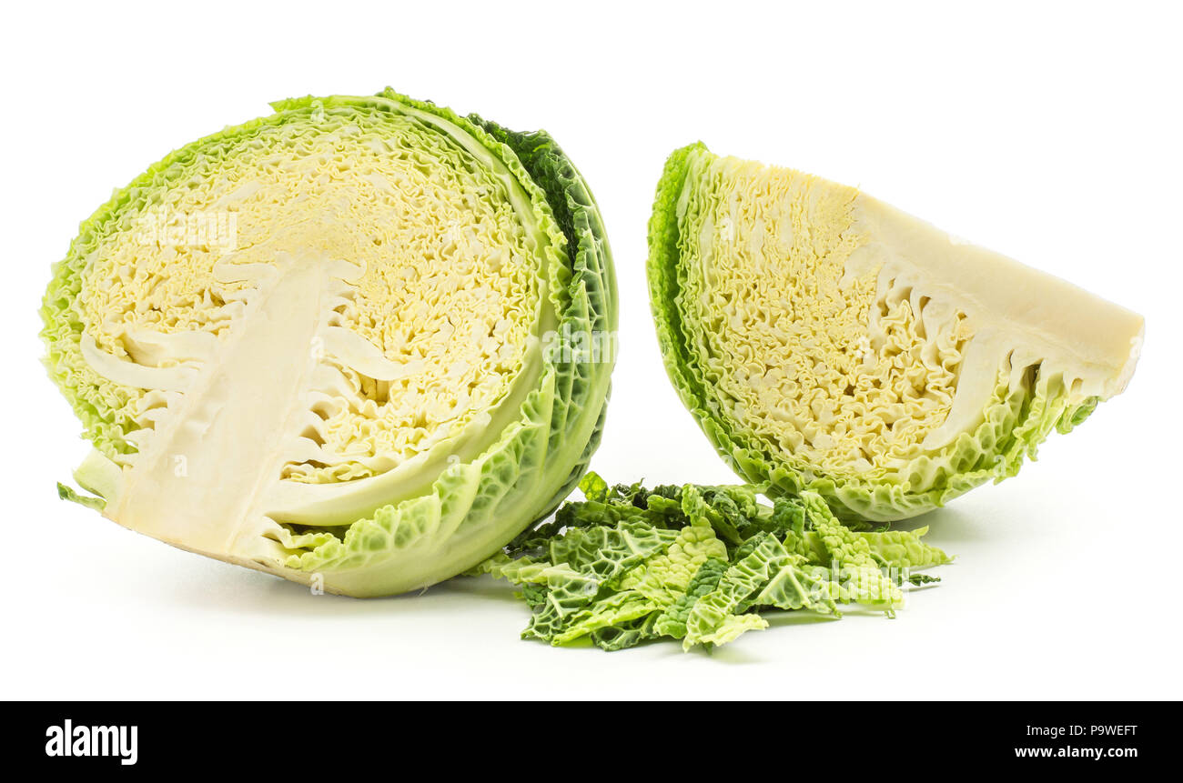 Savoy cabbage one half and sliced quarter with chopped leaves stack ...
