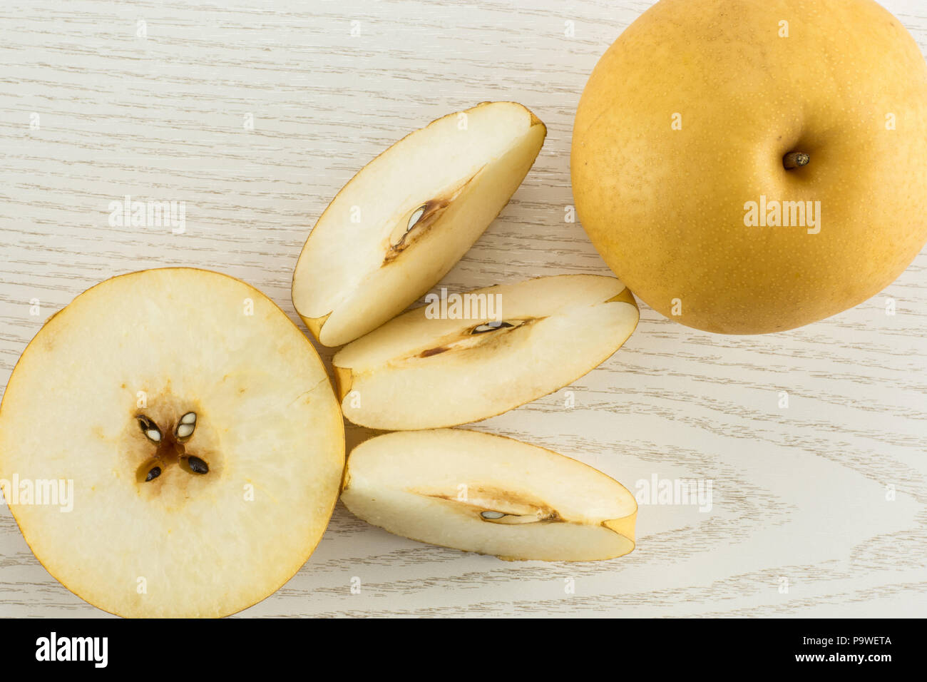 Chinese golden pears top view Nashi variety isolated on white wooden ...