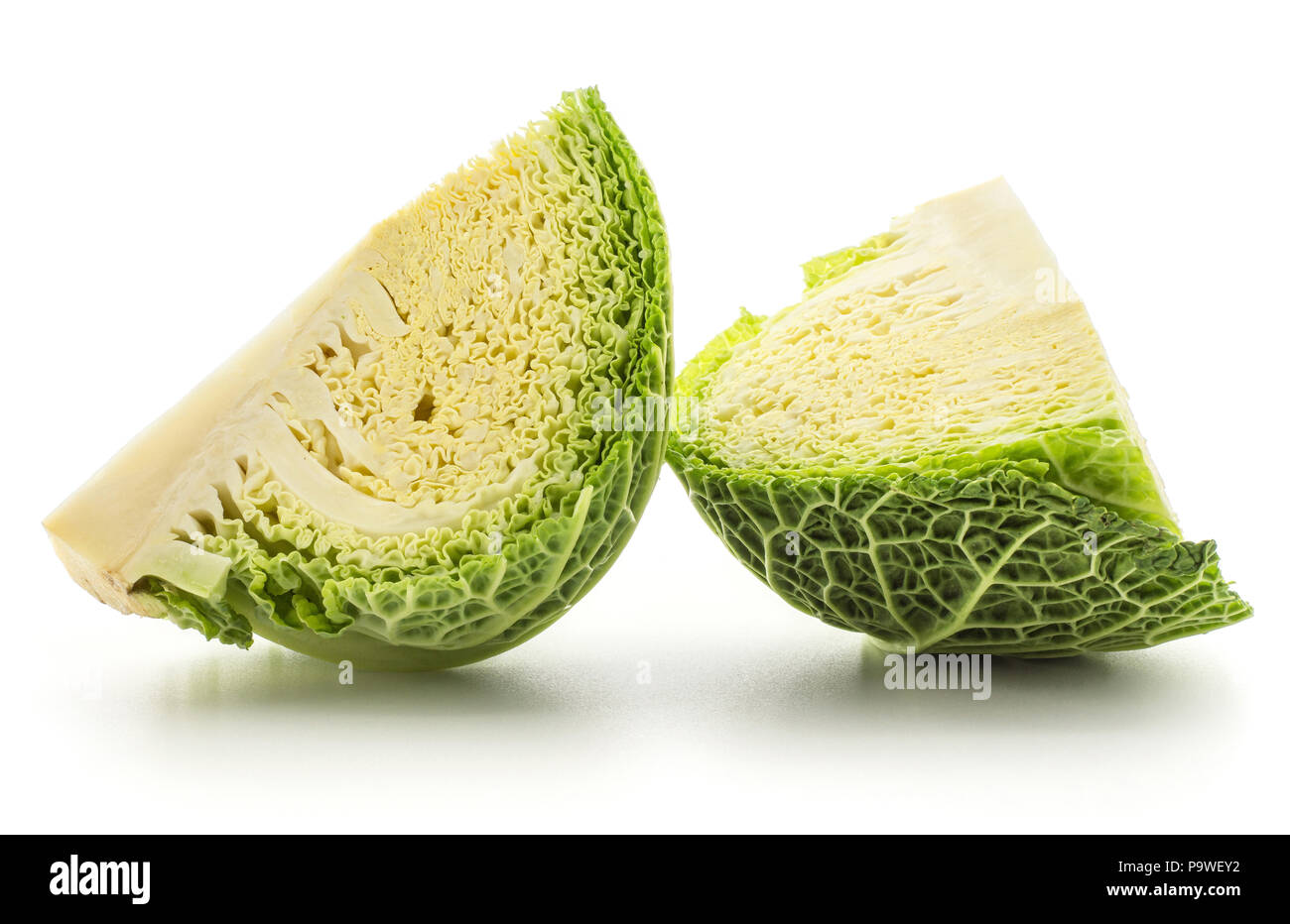 Savoy cabbage two quarter slices isolated on white background fresh cut ...