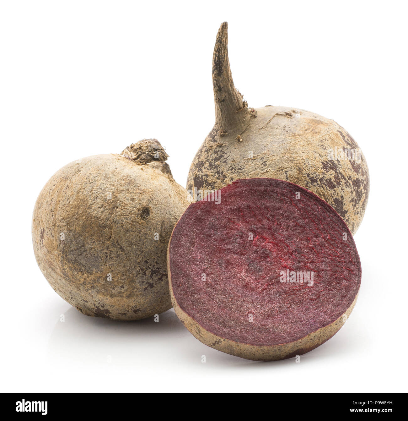 Two beetroot (raw red beet) bulbs and one slice isolated on white ...