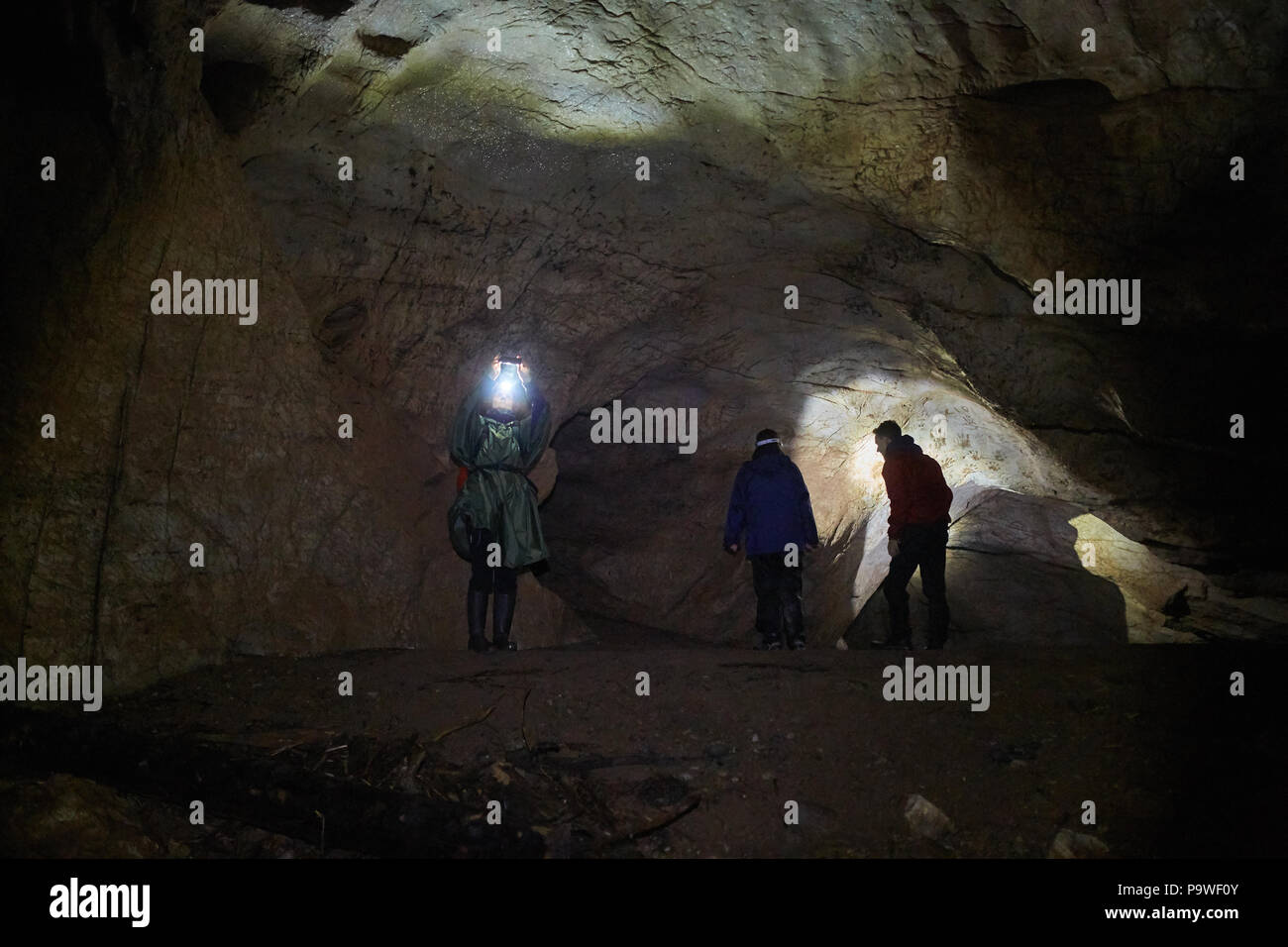 Boy exploring cave hi-res stock photography and images - Alamy