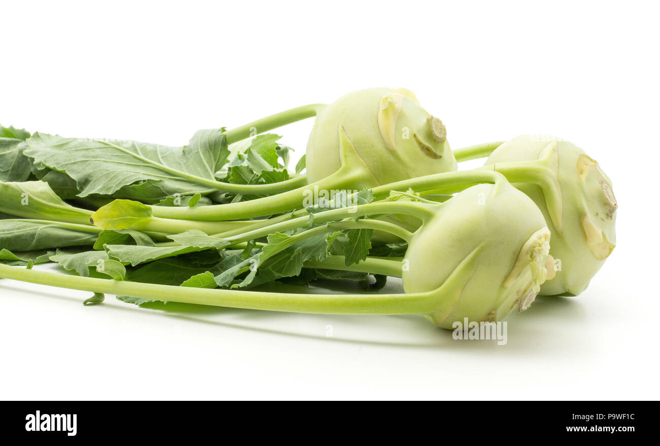 Three kohlrabi (German turnip or turnip cabbage) bulbs with fresh ...