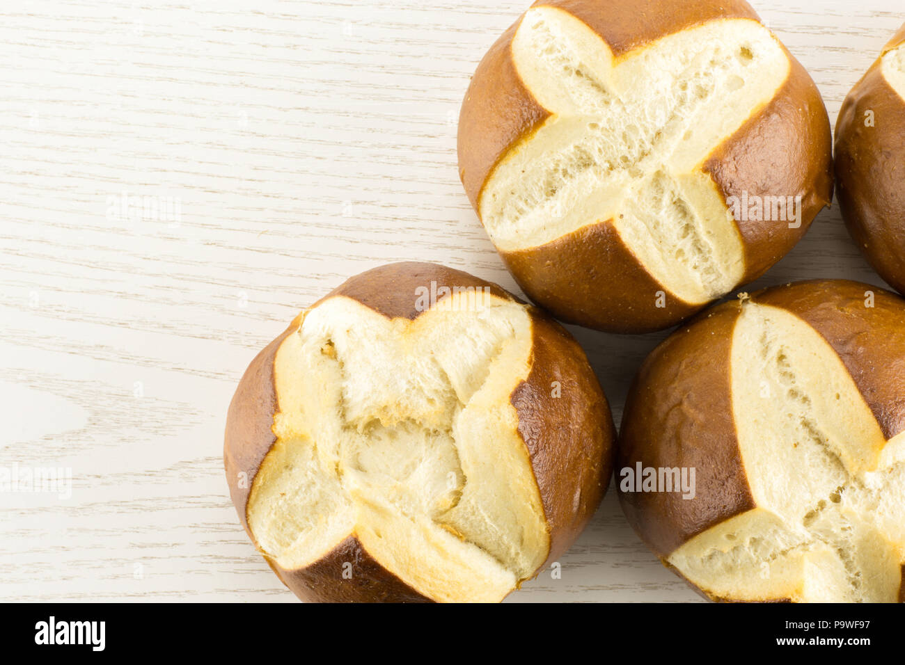 Bavarian bread buns top view on grey wood background fresh baked loaves ...