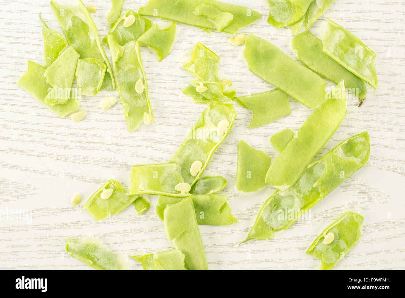Flat green beans fresh top view isolated on light wooden background ...
