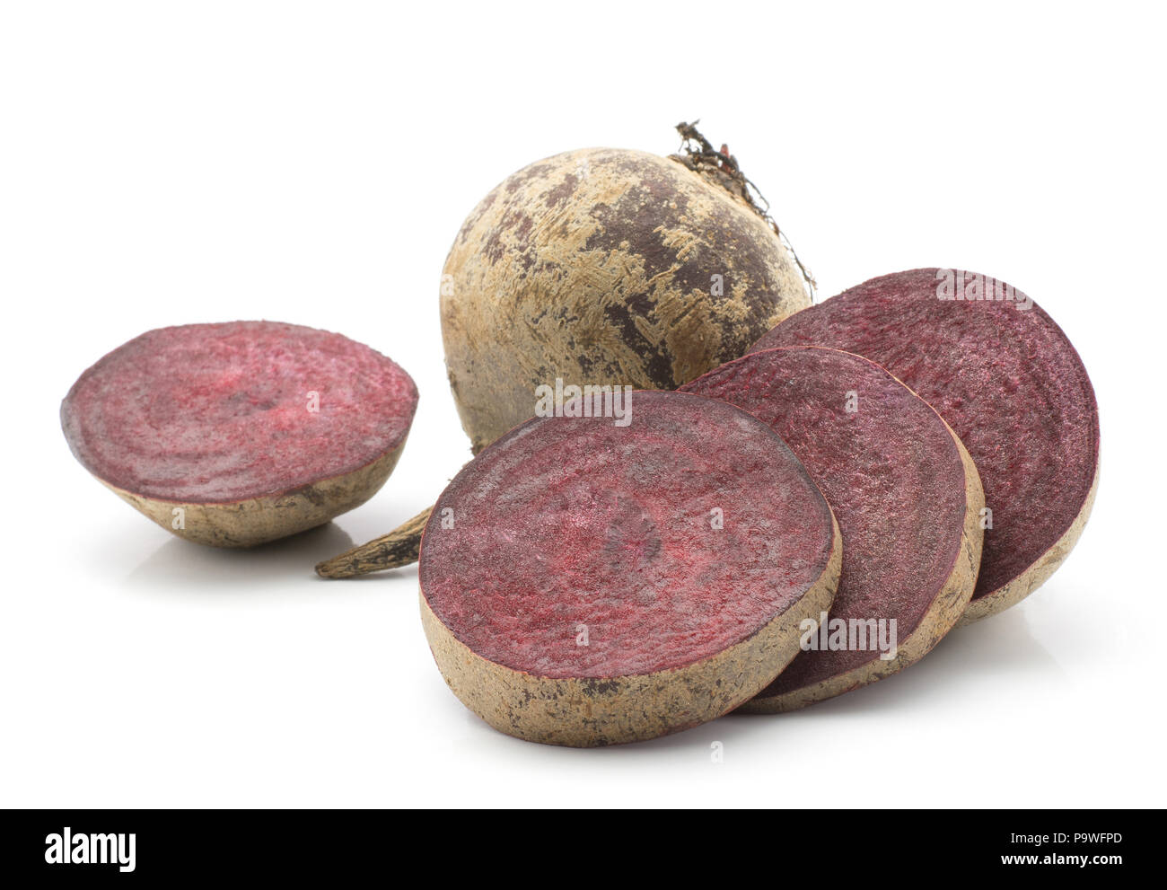 Beetroot (raw red beet) one bulb and four sliced rings isolated on ...