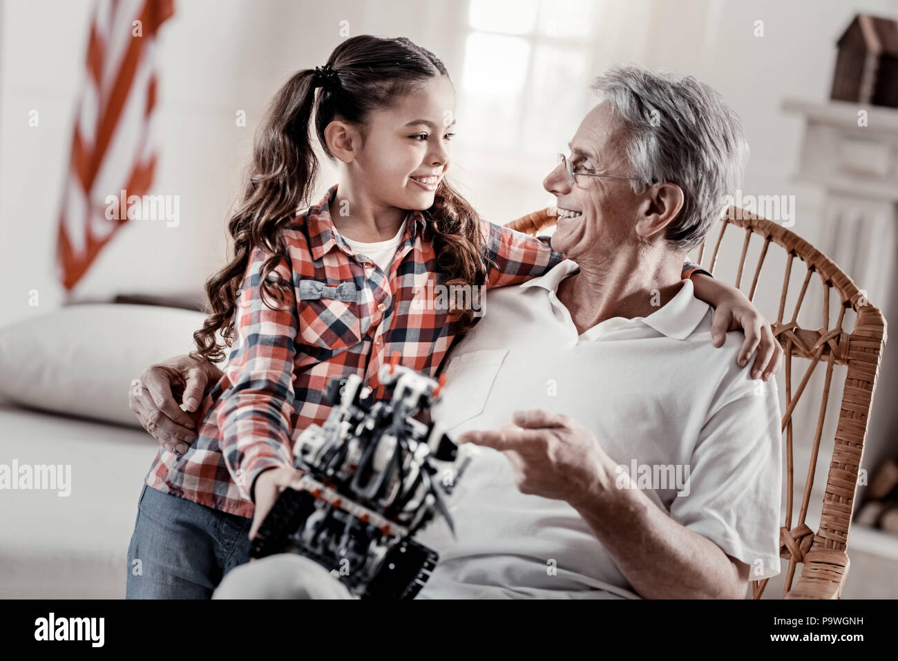 Leisure with science. Adorable peaceful cute grandpa and grandchild ...
