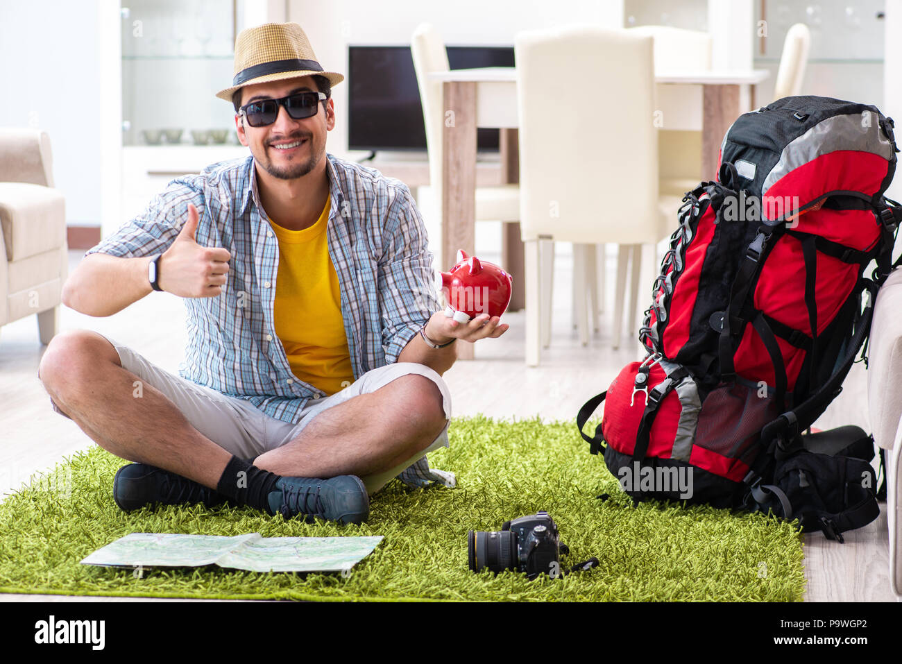 Man planning his travel with map Stock Photo - Alamy