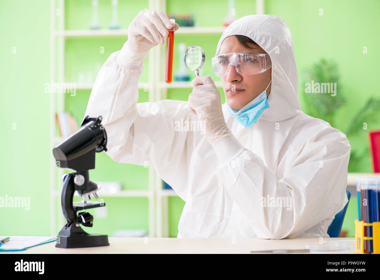 Doctor doing blood analysis in the lab Stock Photo - Alamy
