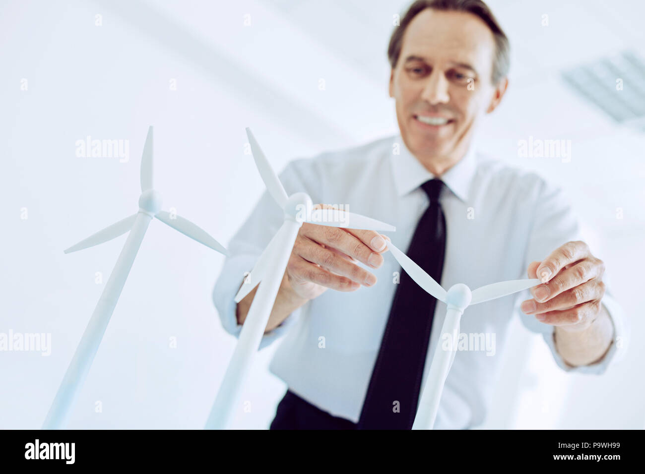 Beautiful model. Smiling cheerful man looking happy and excited while ...